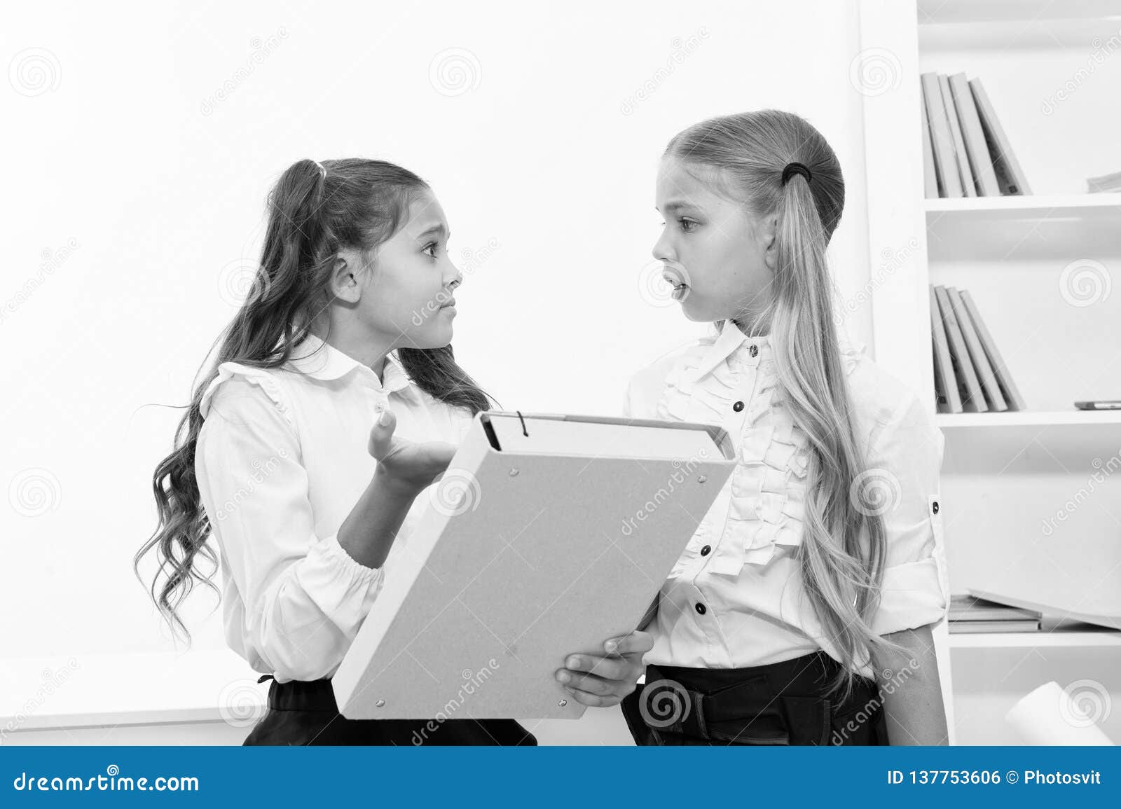 Small Girls Children Back To School in Education Class. Girls Solve ...