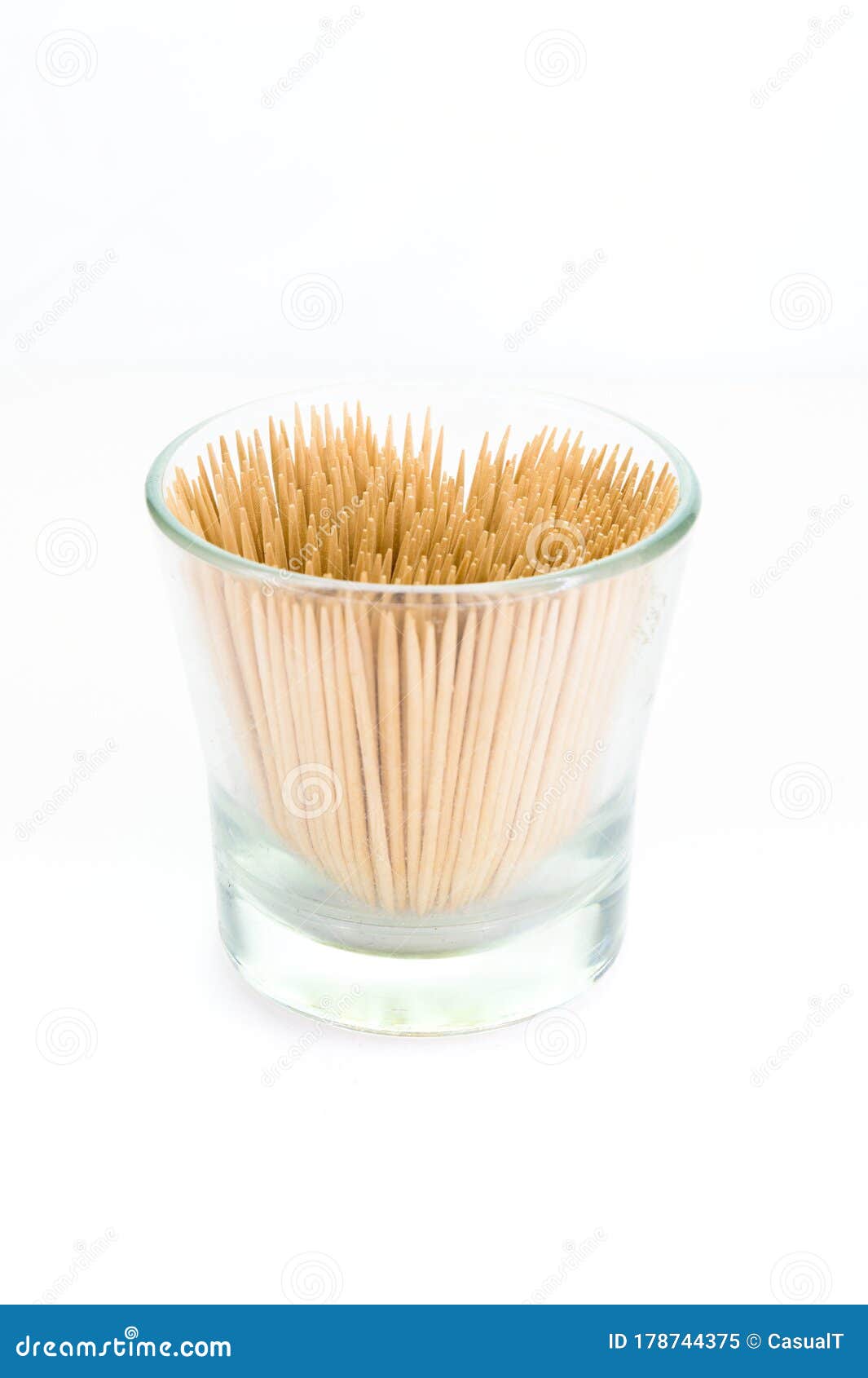 A Small Glass Filled with Toothpicks, Isolated on White Background ...
