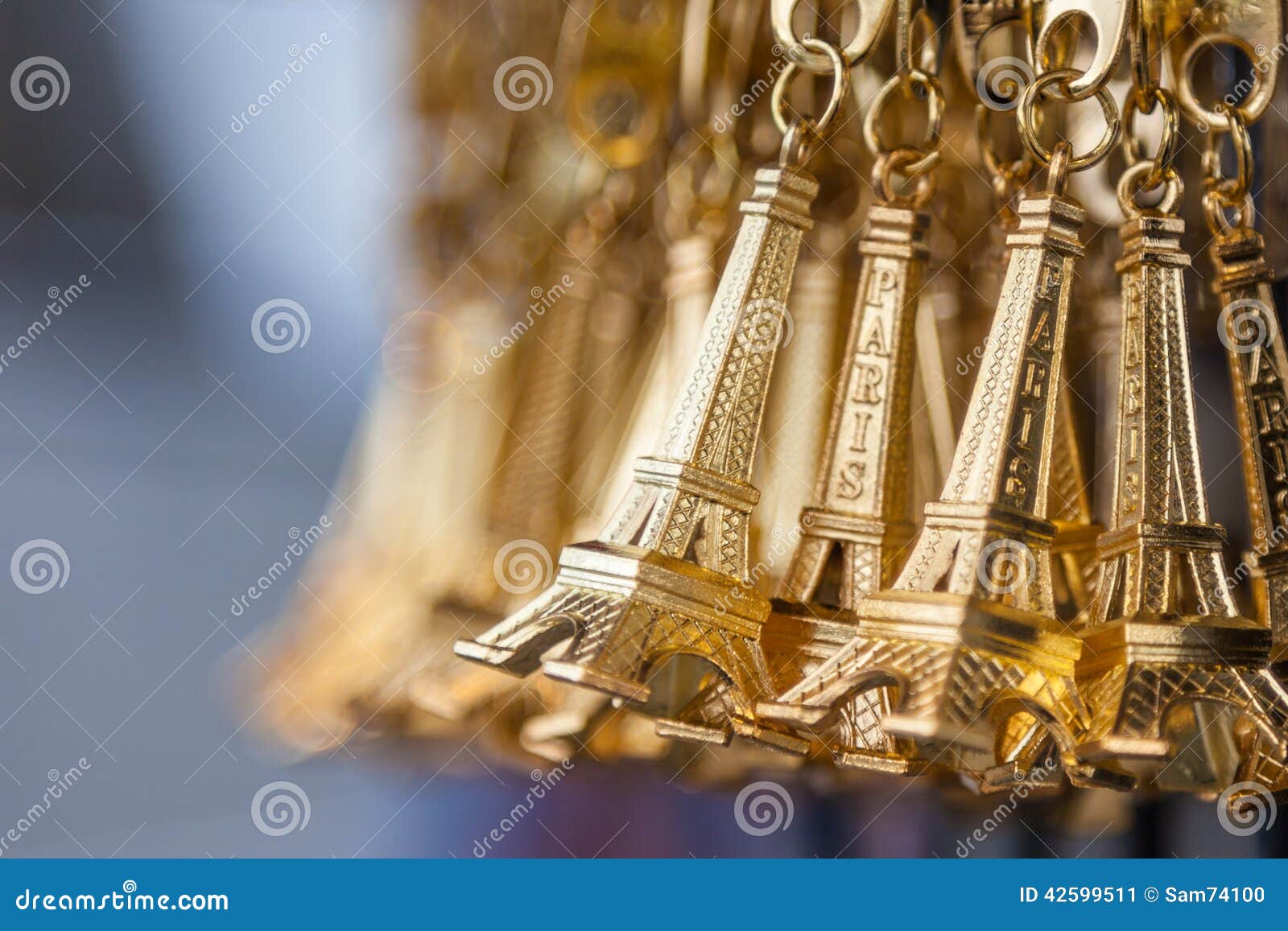Small Gold Eiffel Tower Key Chain in a Souvenir Shop Stock Image ...