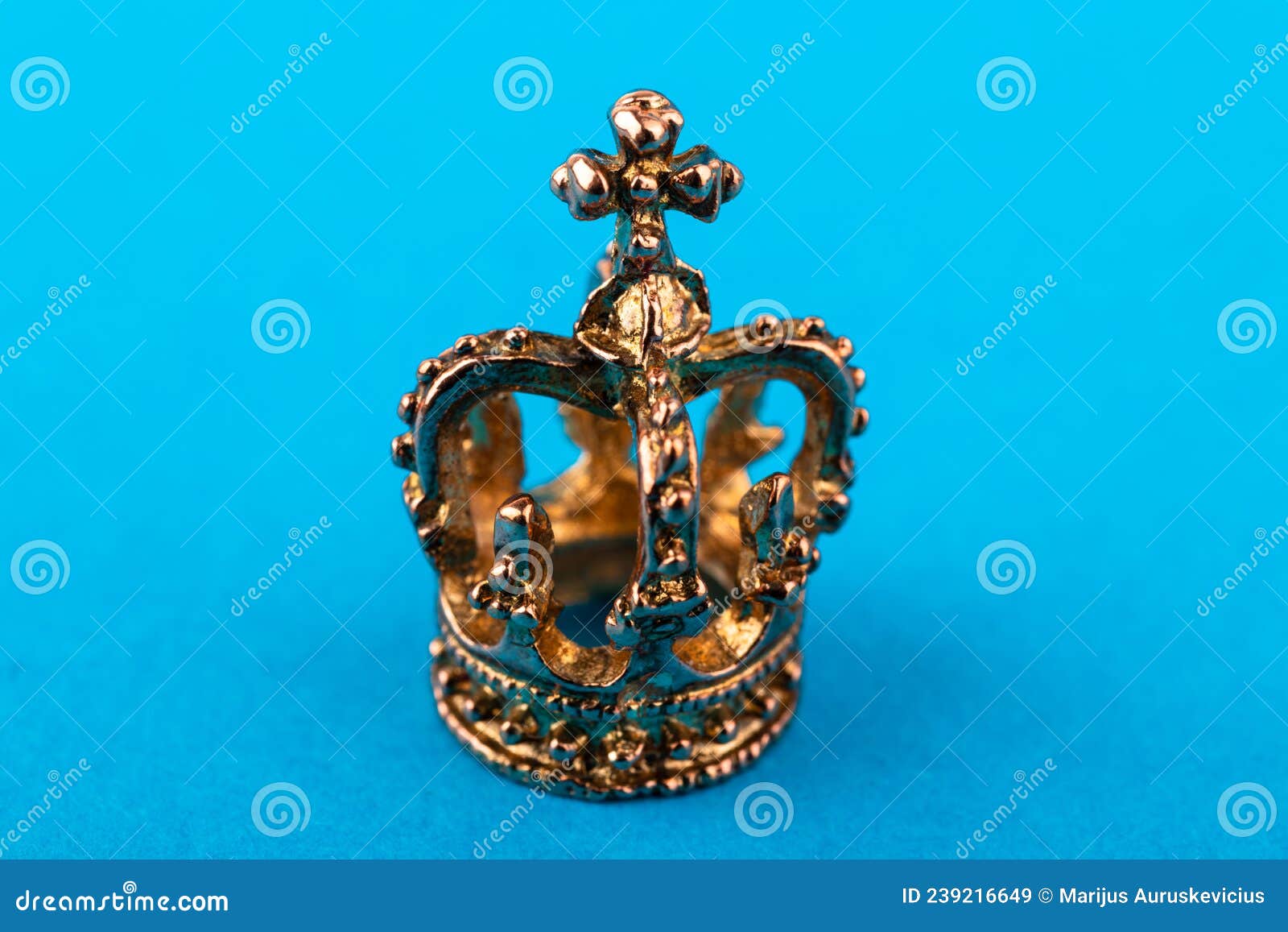 Small Golden Crown on Blue Background Stock Image - Image of monarchy ...