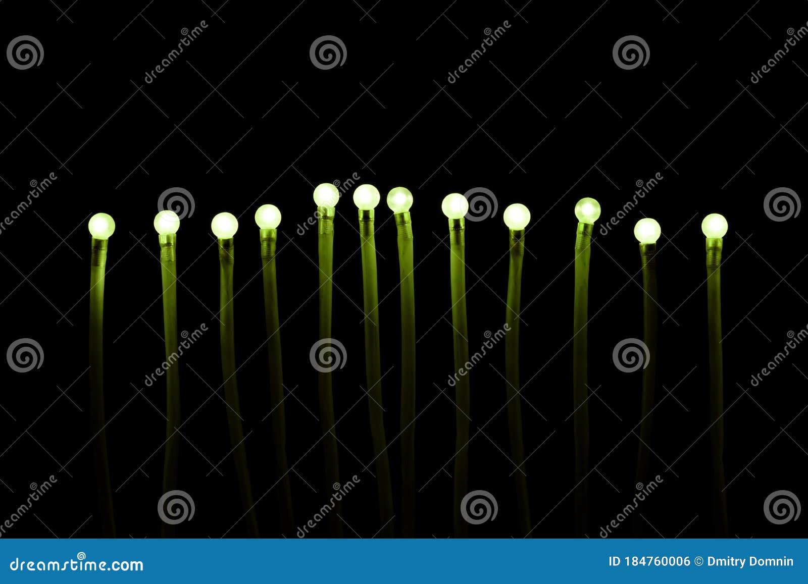 Small Green Light Bulbs on Long Wires Stock Photo - Image of bulbs ...
