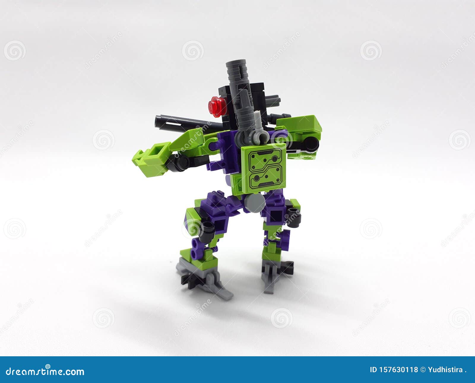 Small Green Transformable Robot Toy on White Isolation Background 14 ...