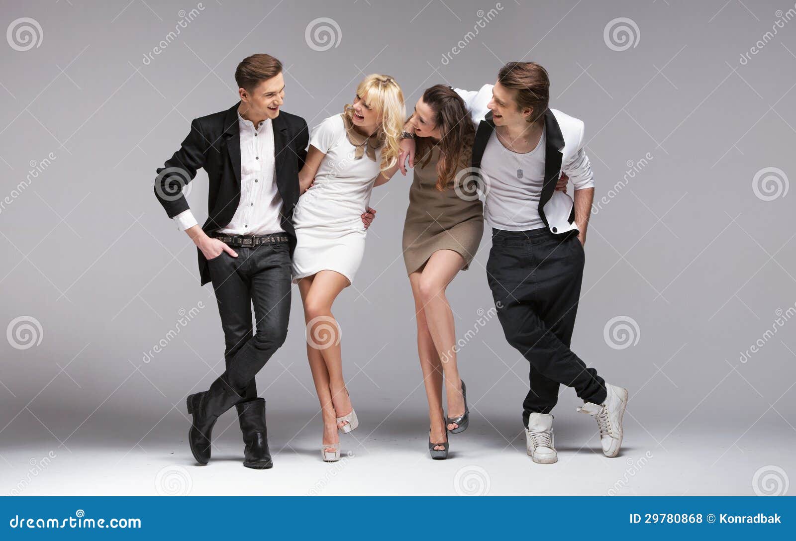 Small Group of Laughing Models Stock Photo - Image of advert, dress ...