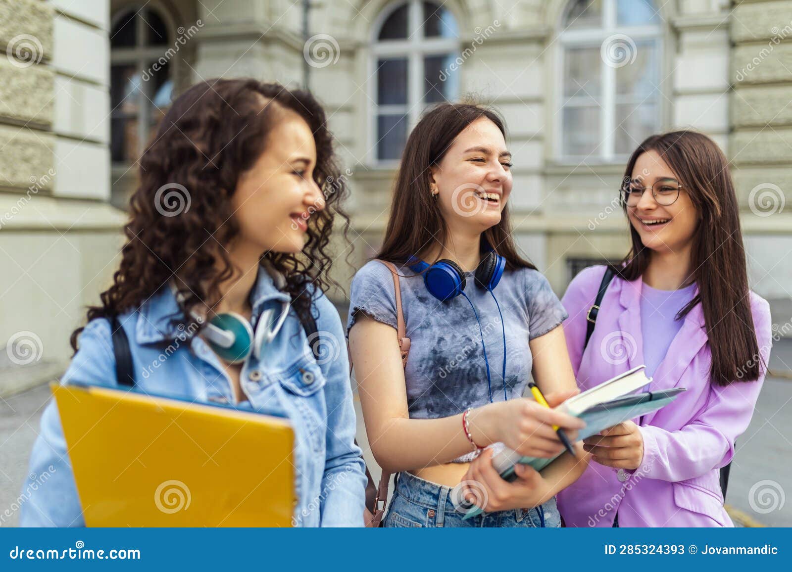 Group of Students Studying Outside of Their Campus and Talking about ...