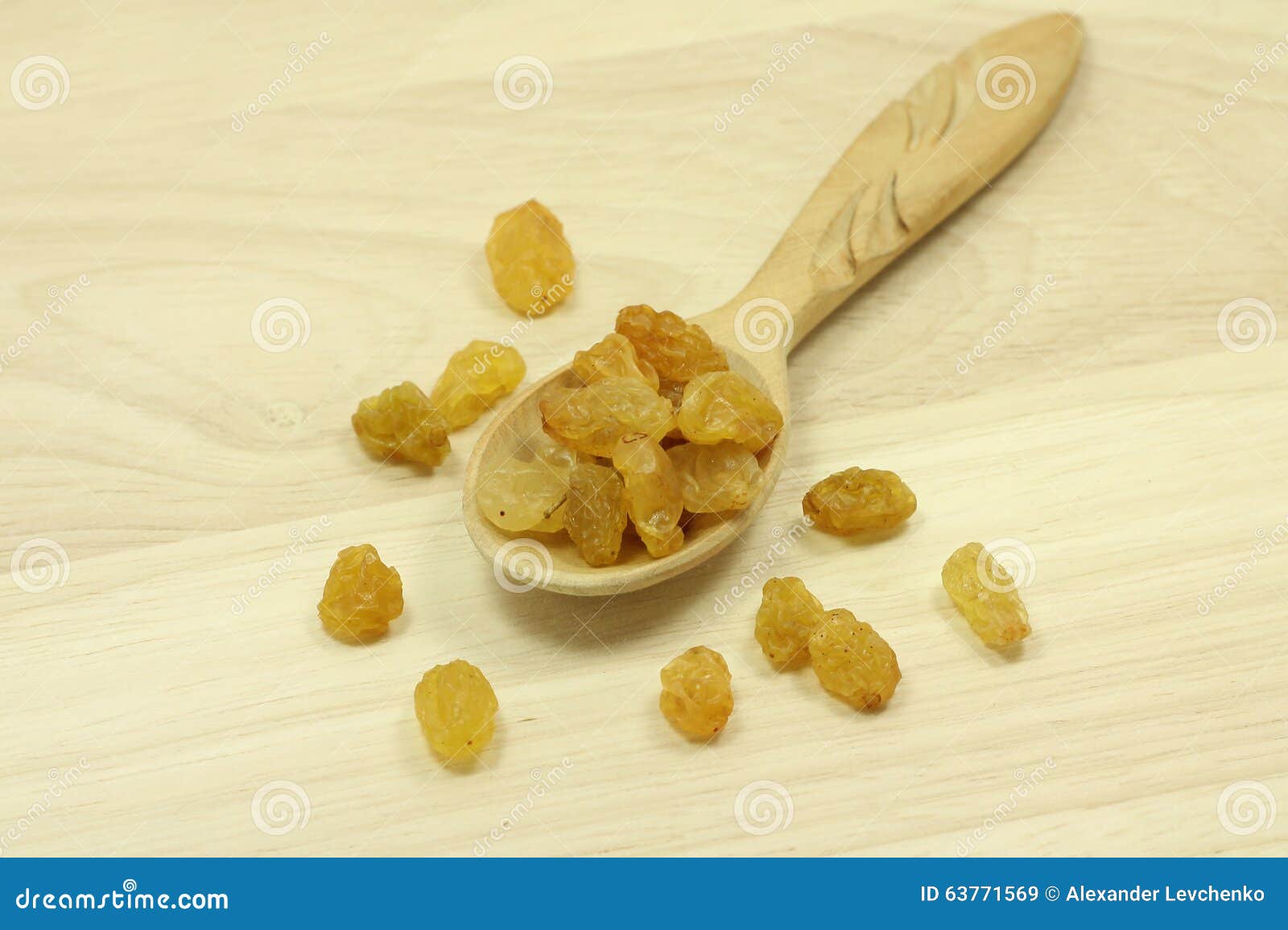Small Handful of Raisins in a Wooden Spoon Stock Image - Image of spoon ...