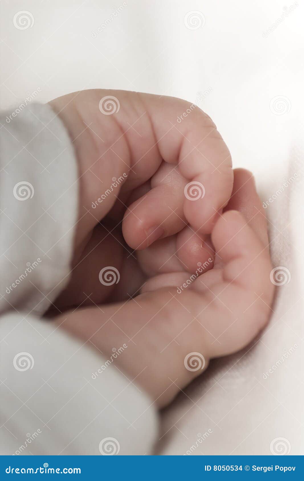 Two Small Hands On A Table Royalty-Free Stock Photography ...