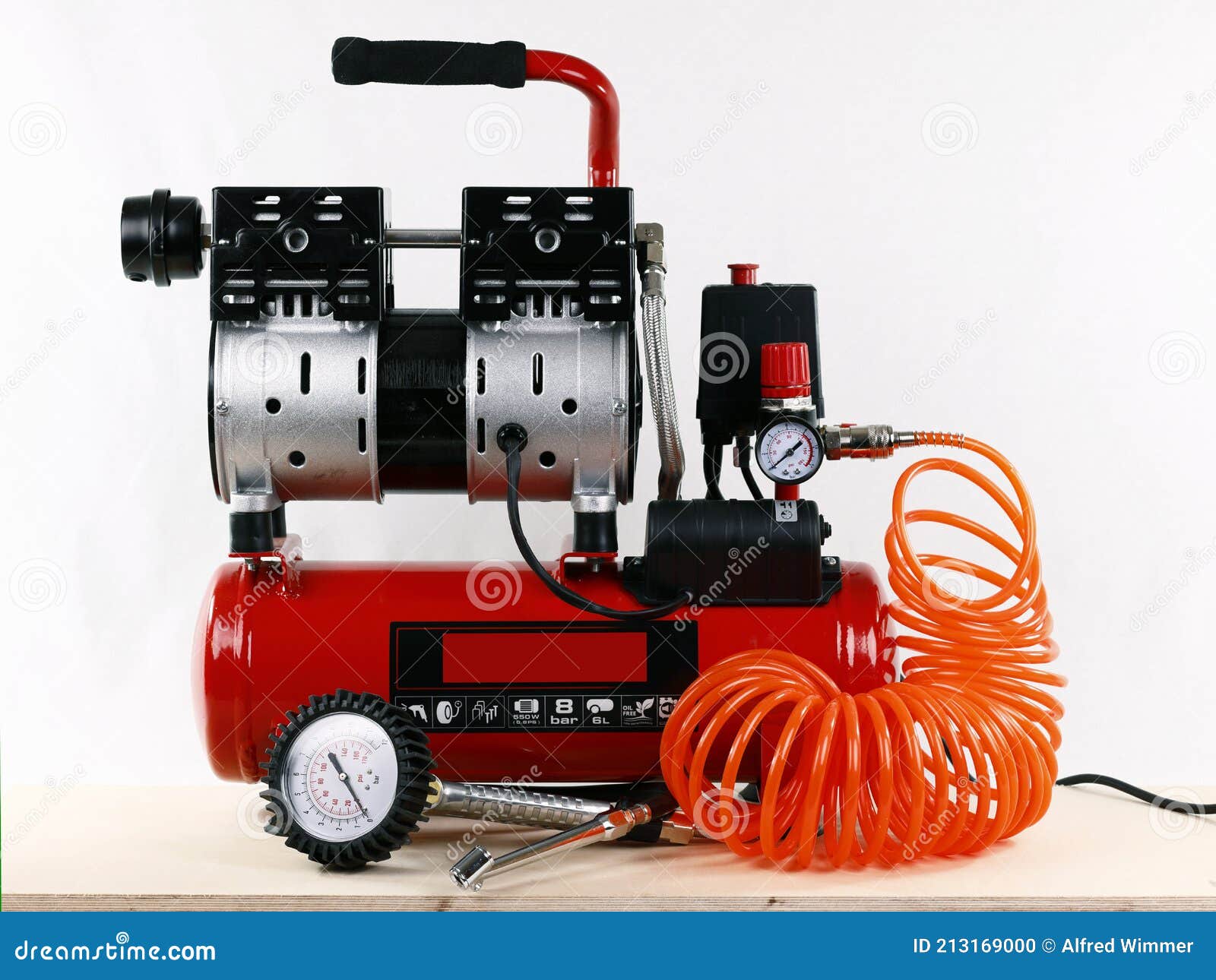 A Small, Silent and Handy Compressor with Pressure Hose Stock Photo ...
