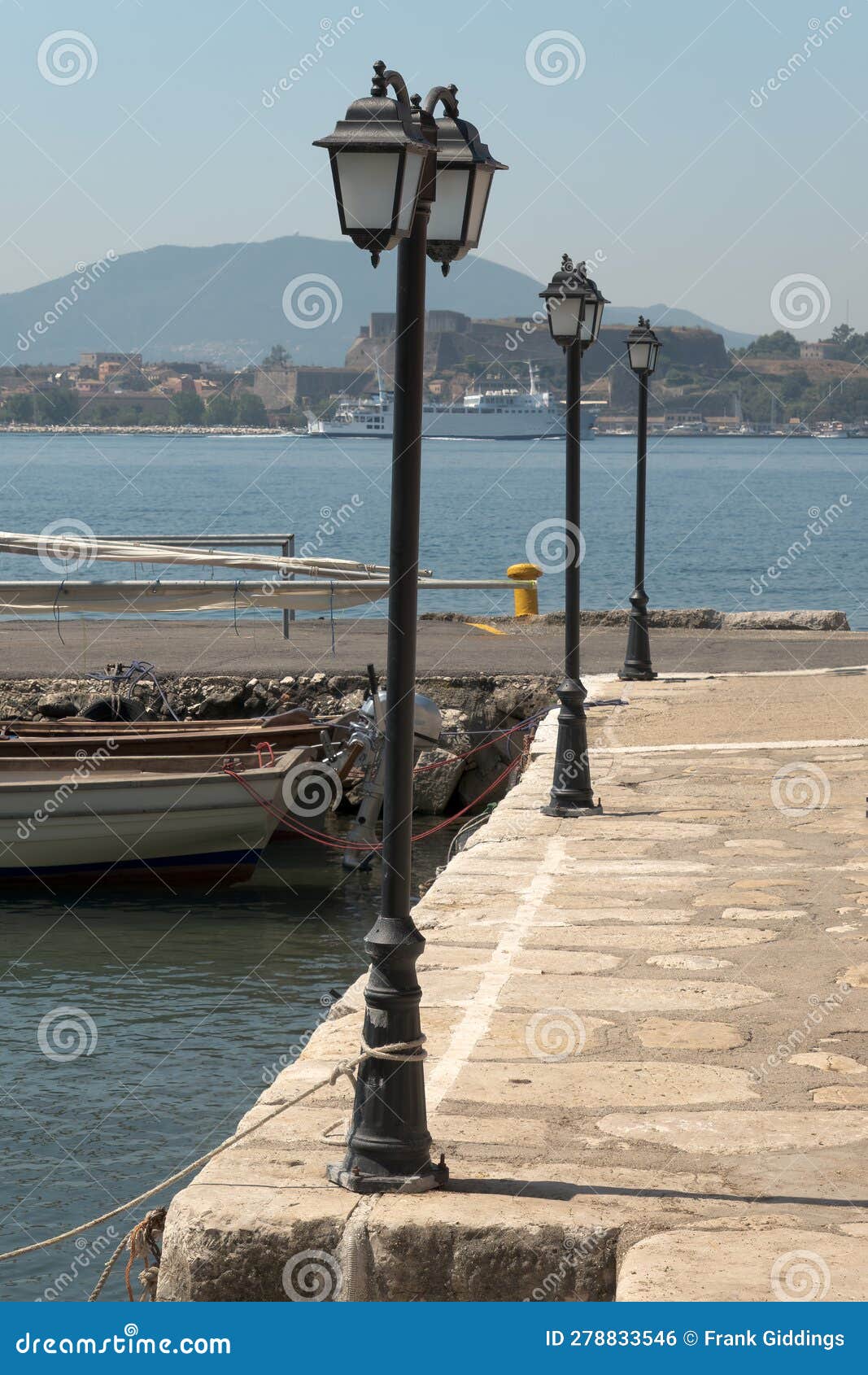 A Row of Lamp Posts with Corfu Town in the Background Corfu Stock Photo ...