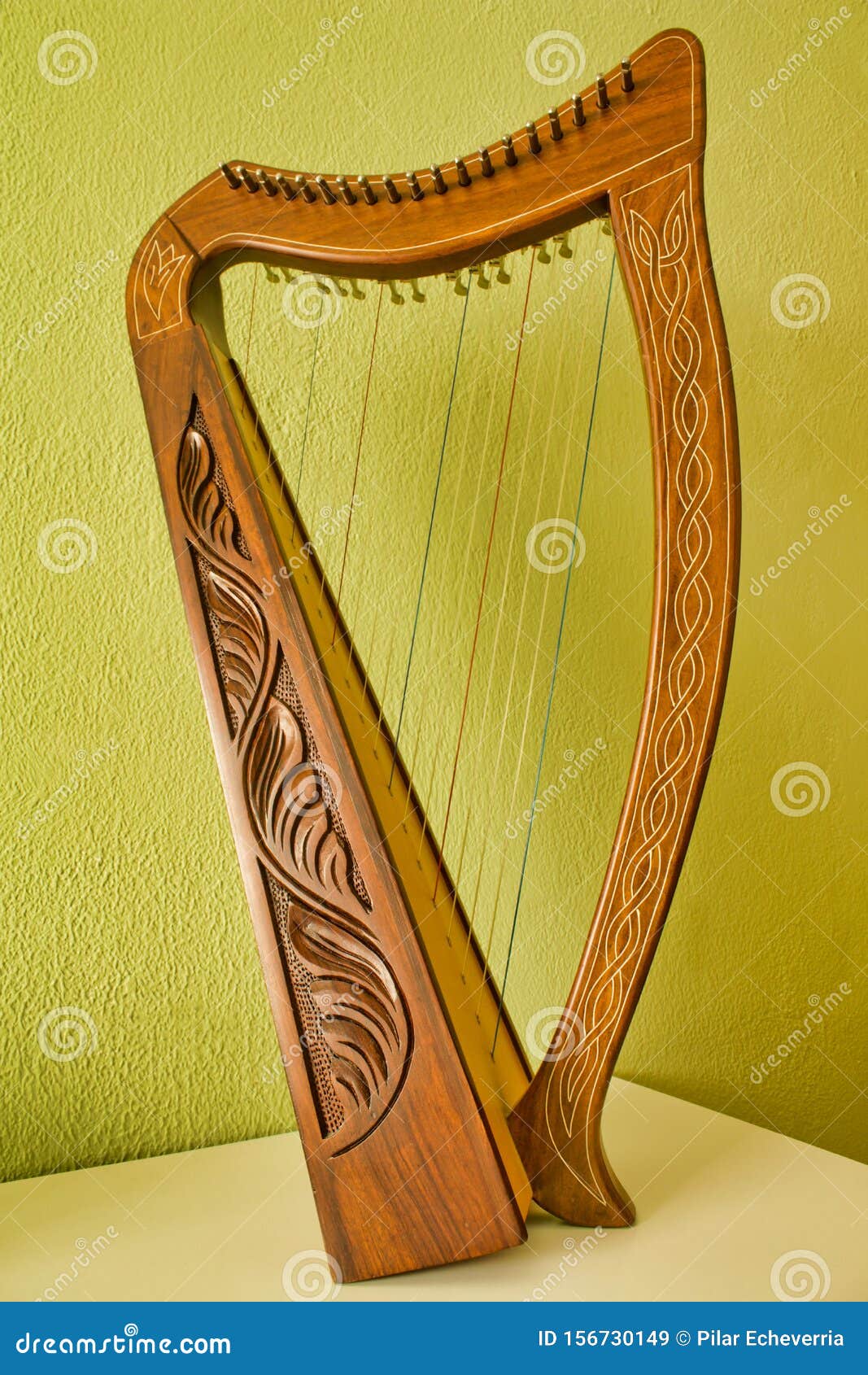Small Harp on a Table stock image. Image of nonprofessional - 156730149