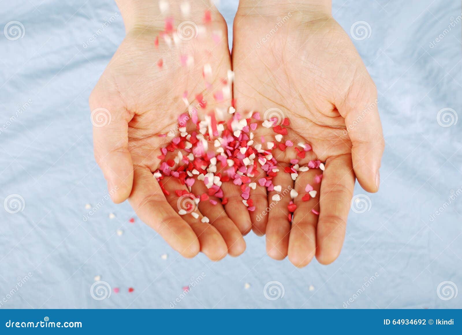 Small Hearts Fall in Female Hands Stock Photo - Image of attractive ...