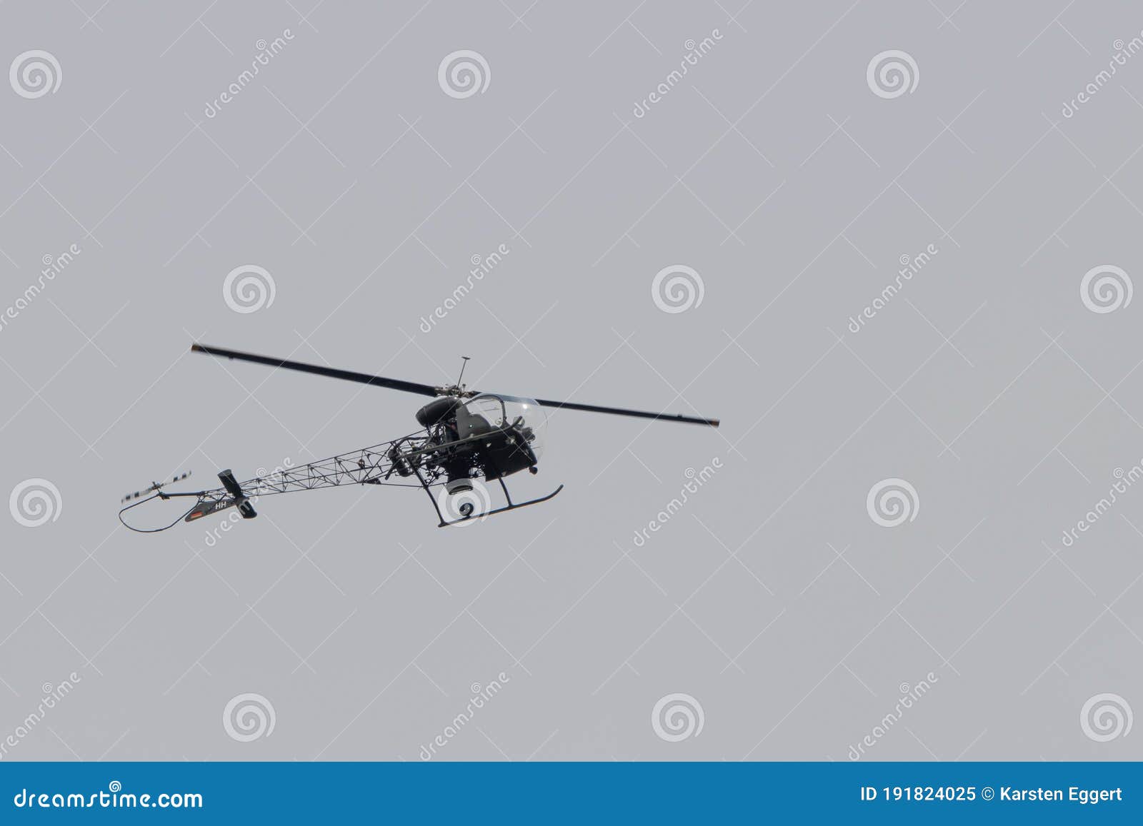 A Small Helicopter with Tubular Frame Flies in the Sky Stock ...