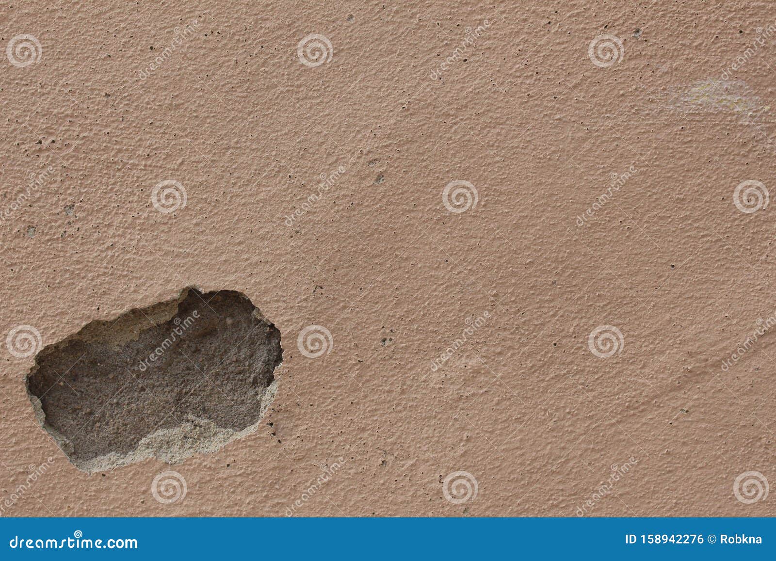 Small Hole in a Beige Colored Wall Stock Photo - Image of concrete ...
