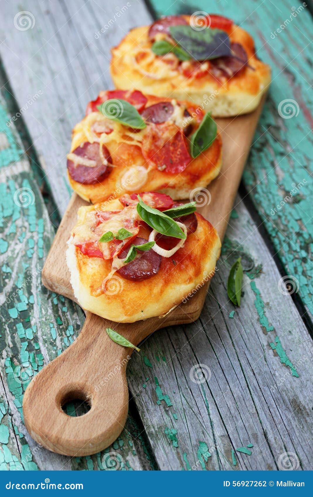 Small homemade pizza stock photo. Image of salami, people - 56927262