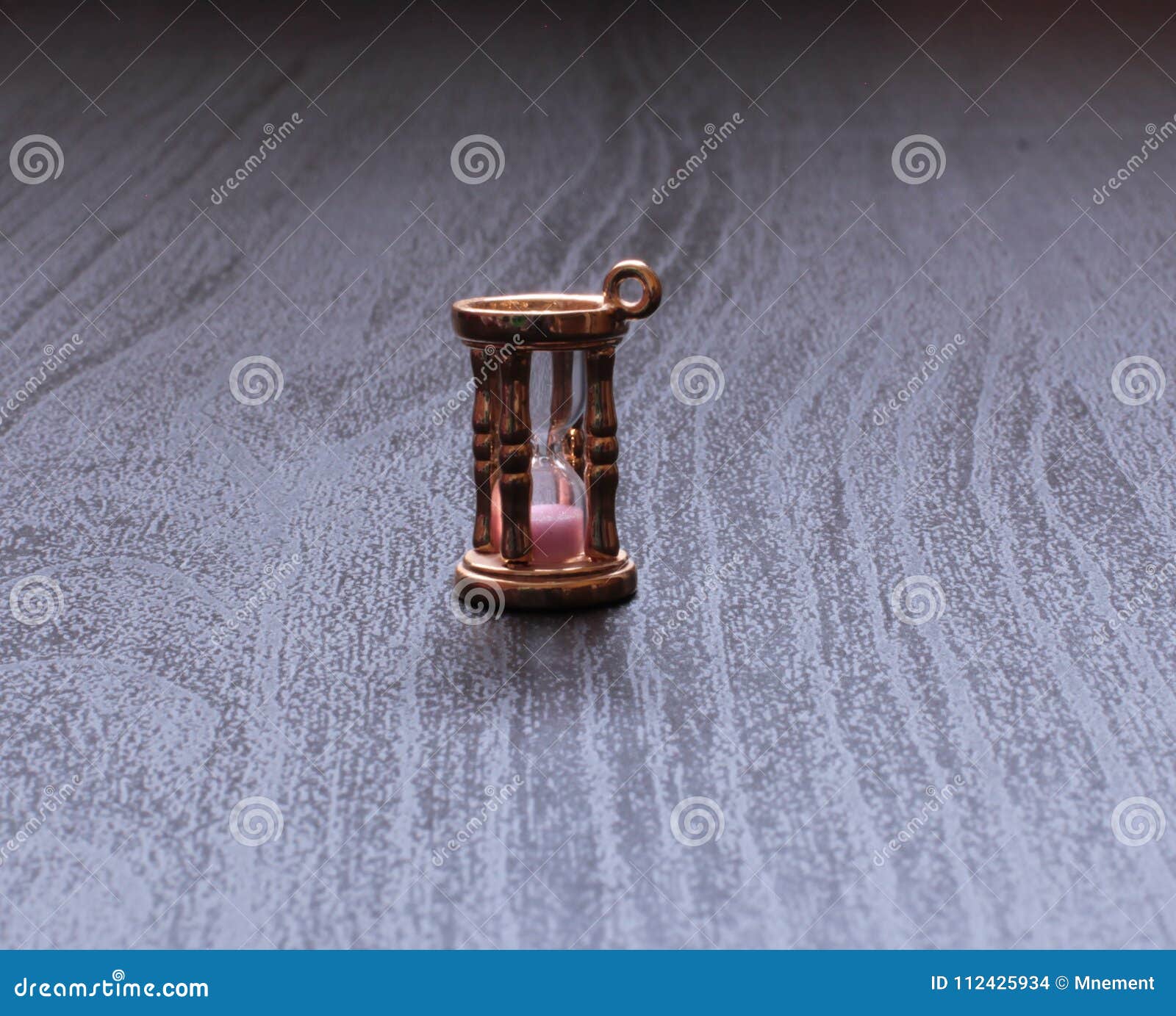 Small hourglass stock photo. Image of time, keychain - 112425934