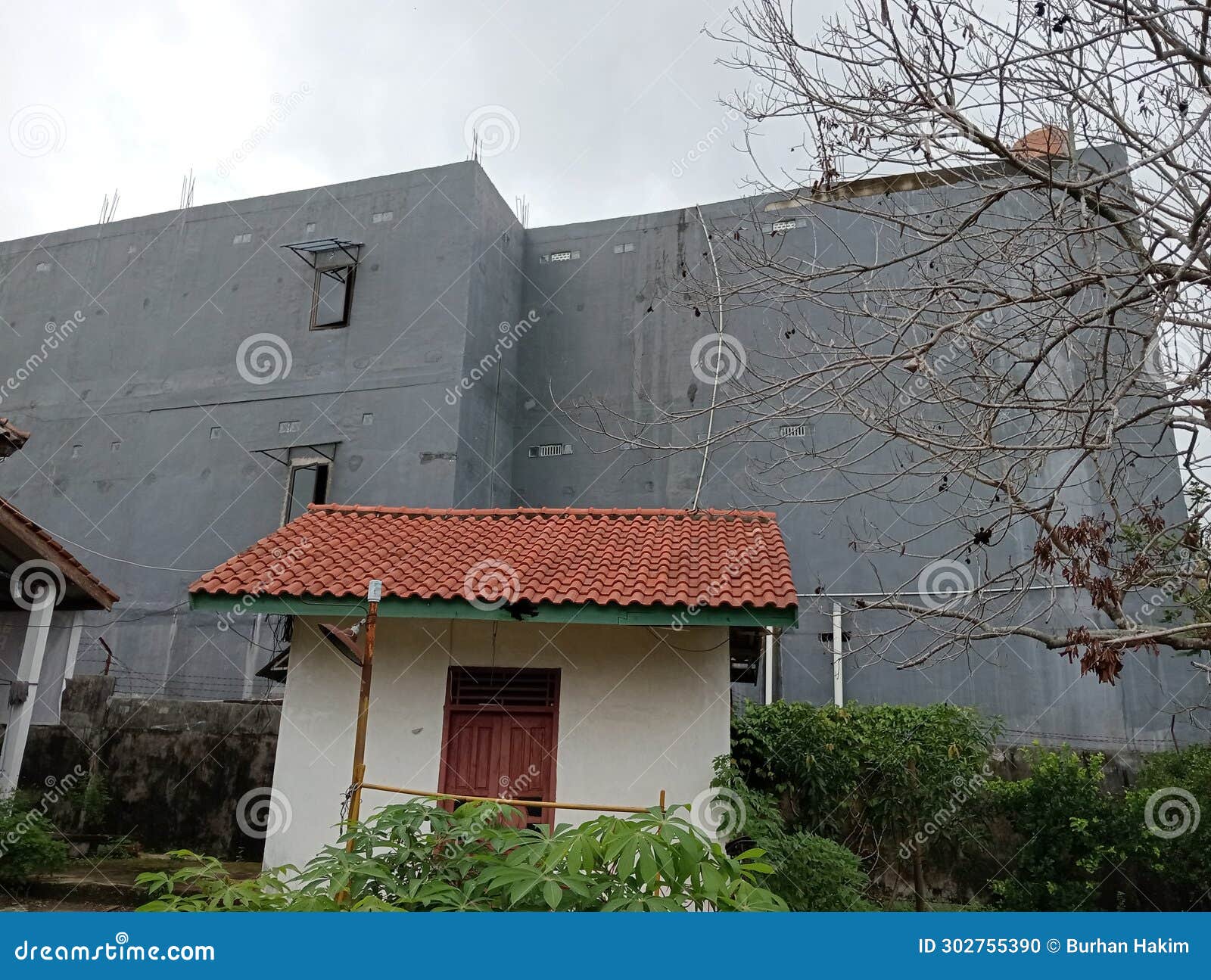 Small House Behind the Building Stock Photo - Image of background ...