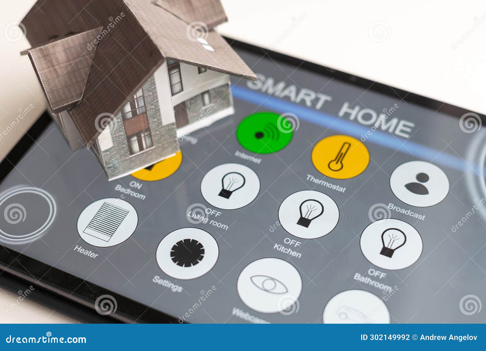 Small House Model is on Screen Tablet and Icons Home Electronics ...