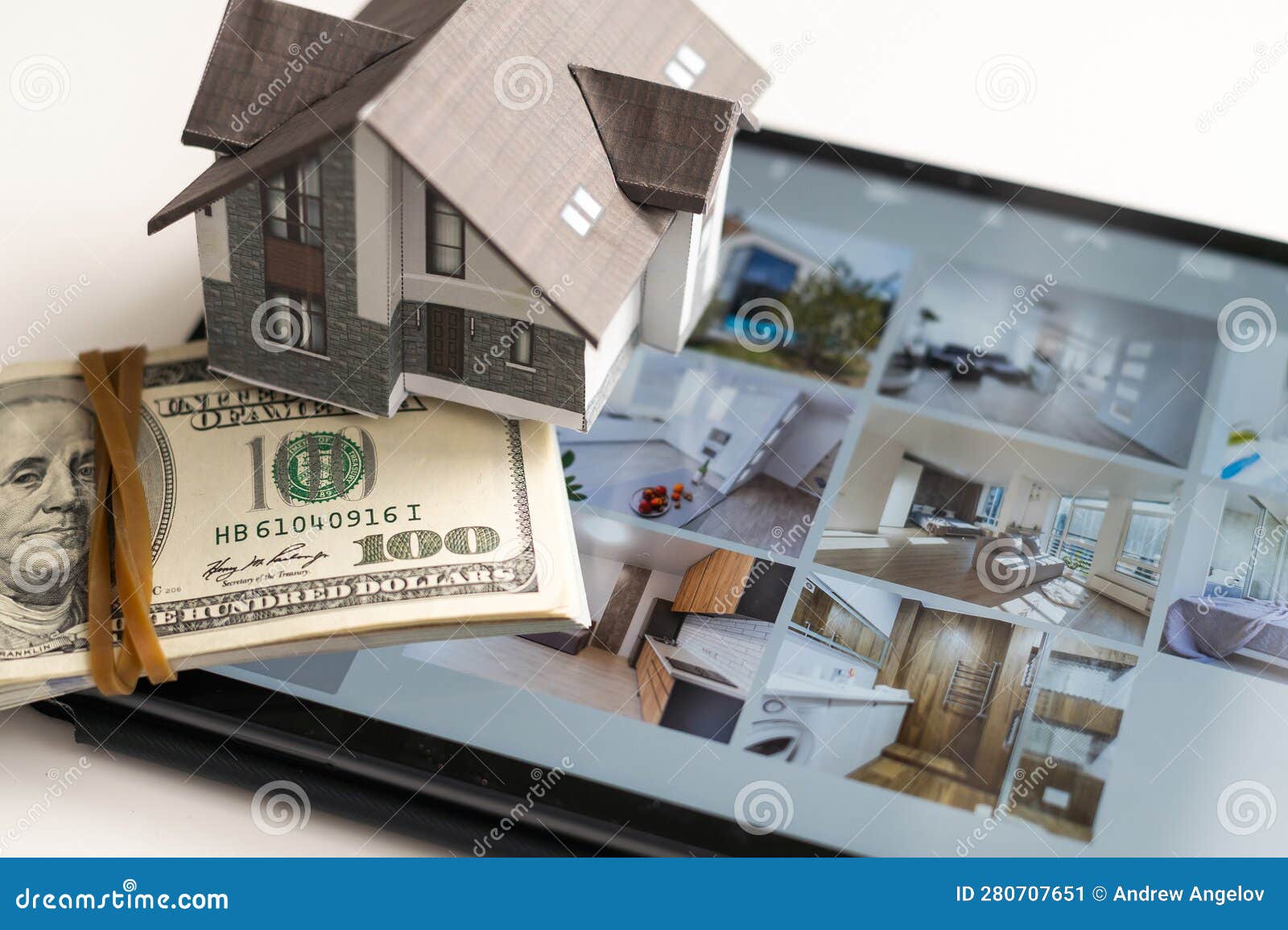 Small House Model is on Screen Tablet and Icons Home Electronics ...