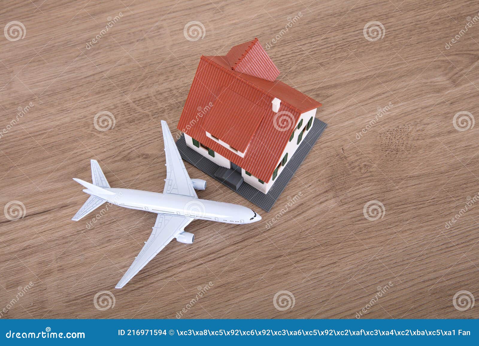 Small House Model and Small Airplane Model on the Table Stock Photo ...