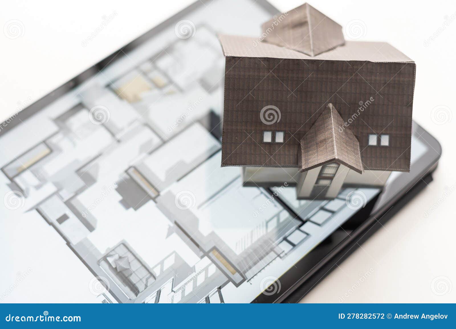 Small House Model is on Table and Icons Home Electronics Devices ...