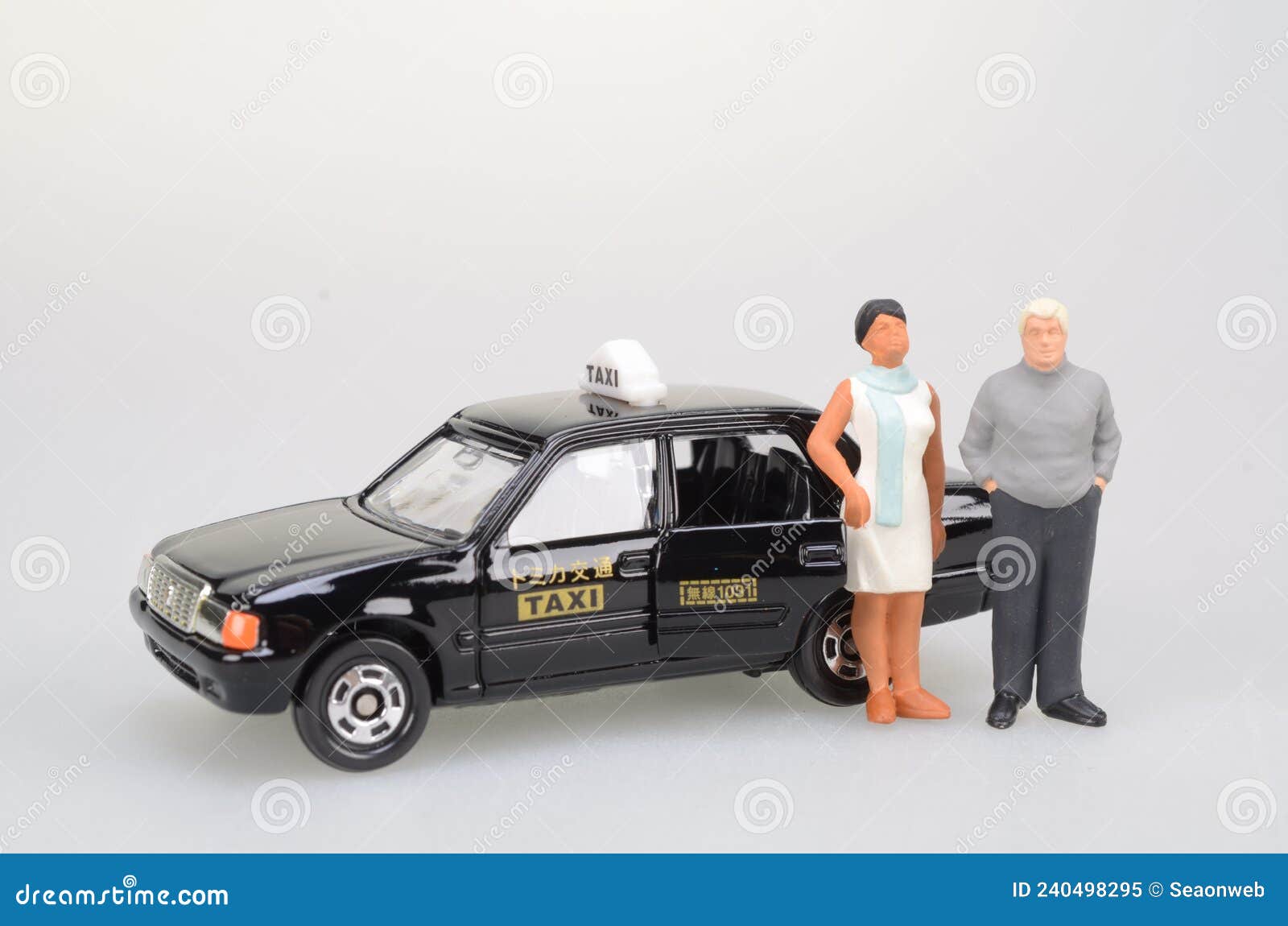 Small Human Figure and a Taxi Stock Image - Image of people, work ...