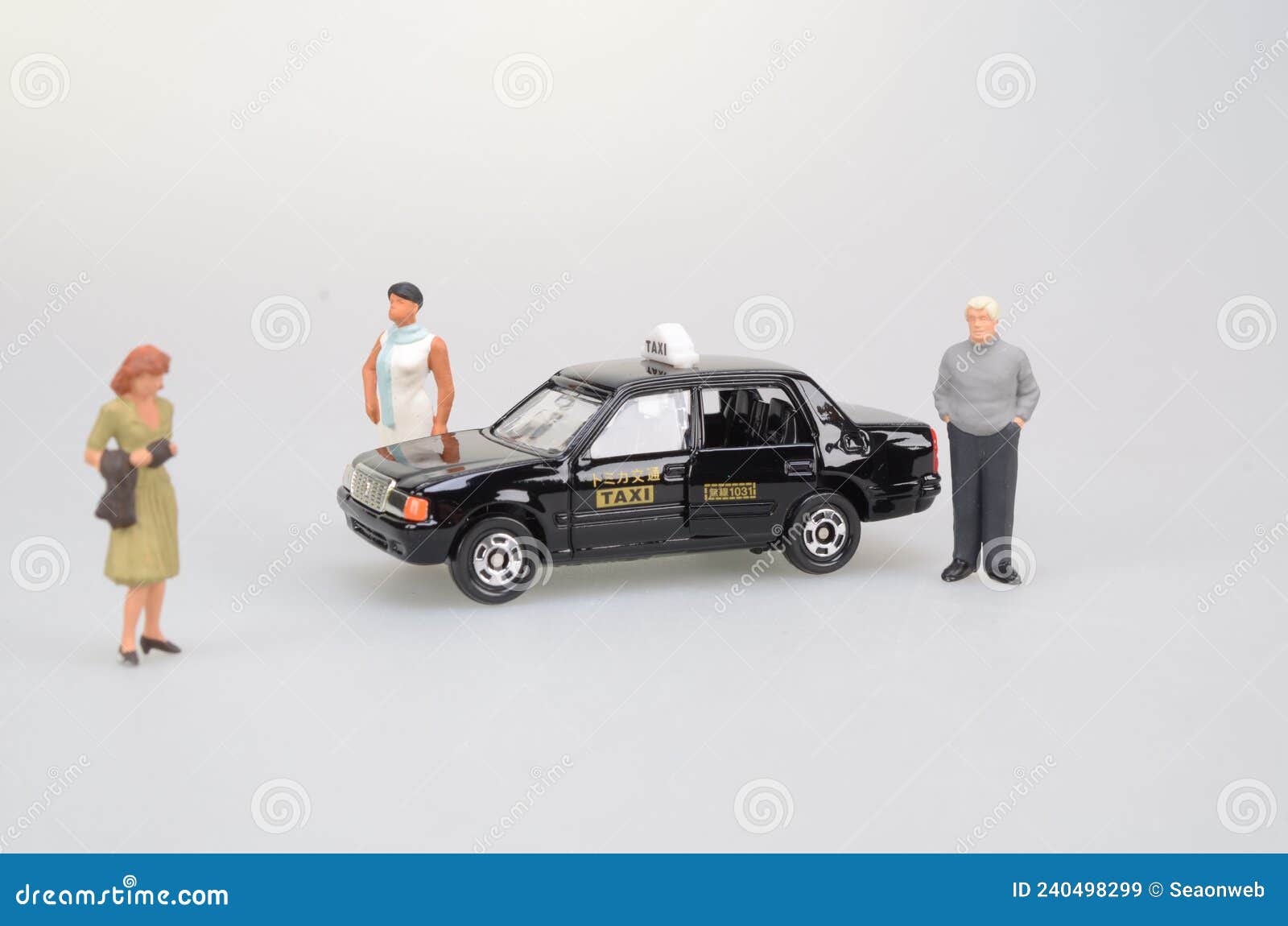 Small Human Figure and a Taxi Stock Image - Image of city, japan: 240498299