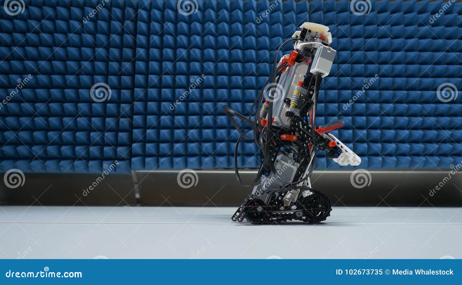 Small Hunan-like Robot Sited on the Table. Modern Robot Goes on the ...