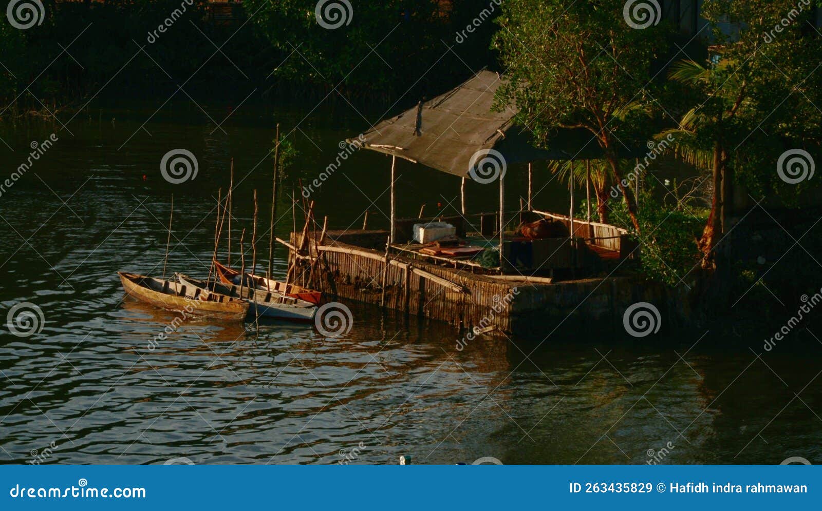 A Small Hut by the River and a Boat at Rest Stock Image - Image of arab ...