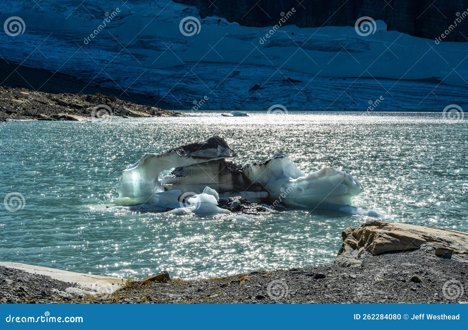Small Iceberg in Upper Grinnell Lake by Grinnell Glacier Stock Photo ...