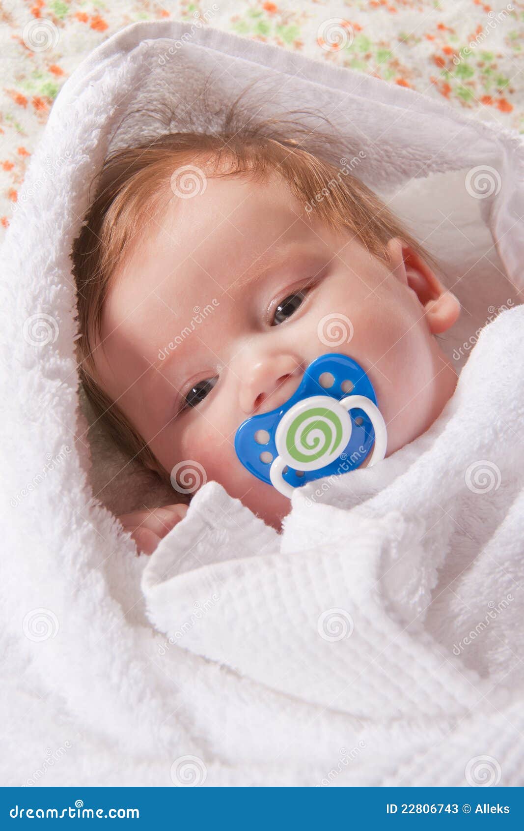 Small Infant with Dummy and Dreamstime Logo on it Stock Image - Image ...