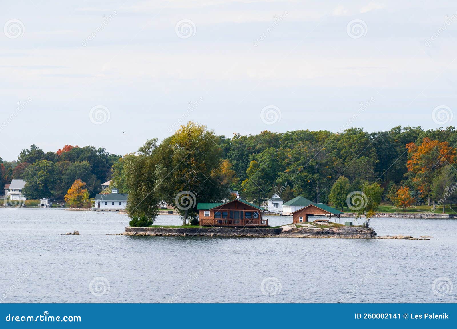 Small Island with a Cottage and a Boathouse Structures Stock Image ...
