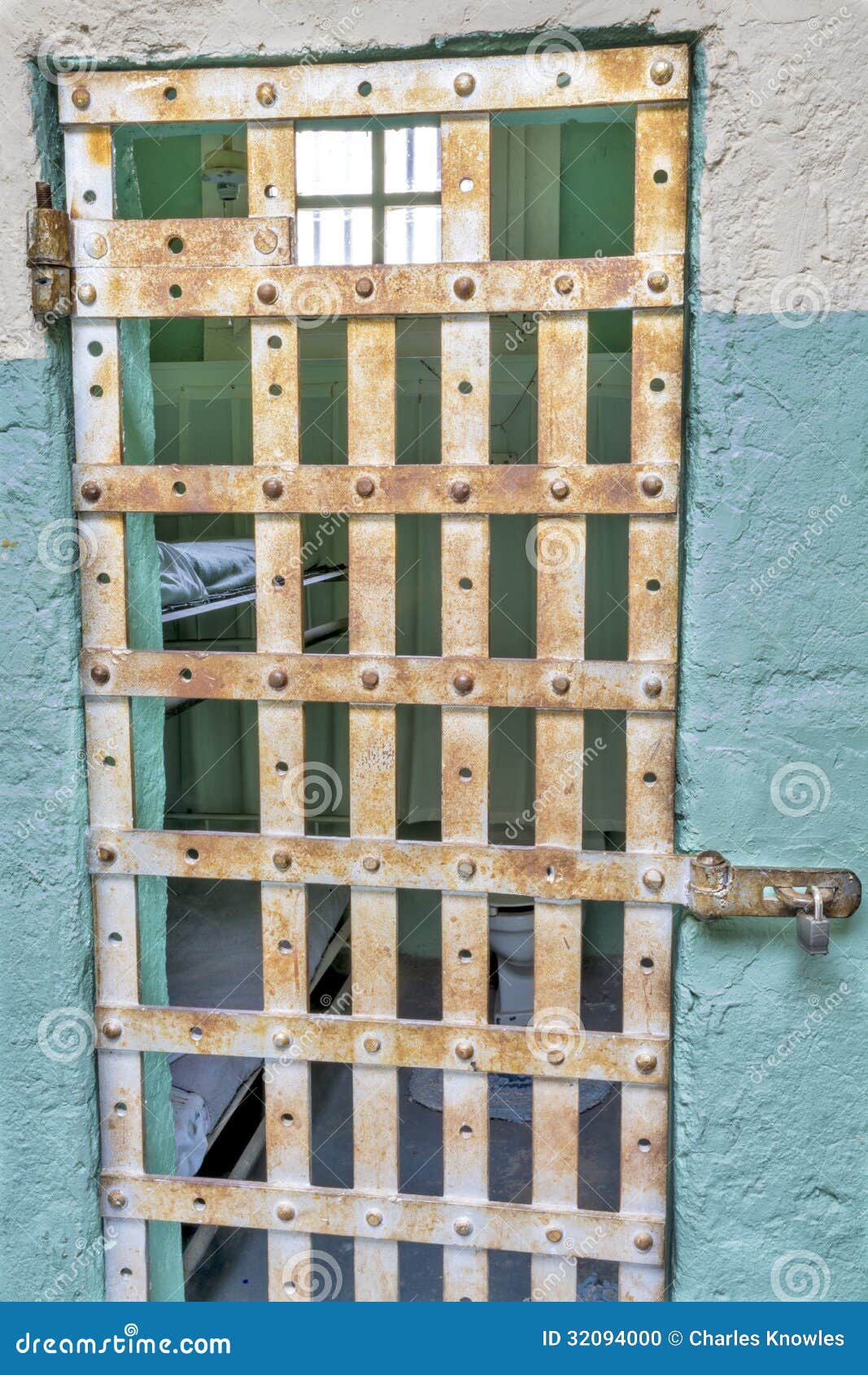 Small Jail Cell with a Bed in it Stock Photo - Image of locked ...
