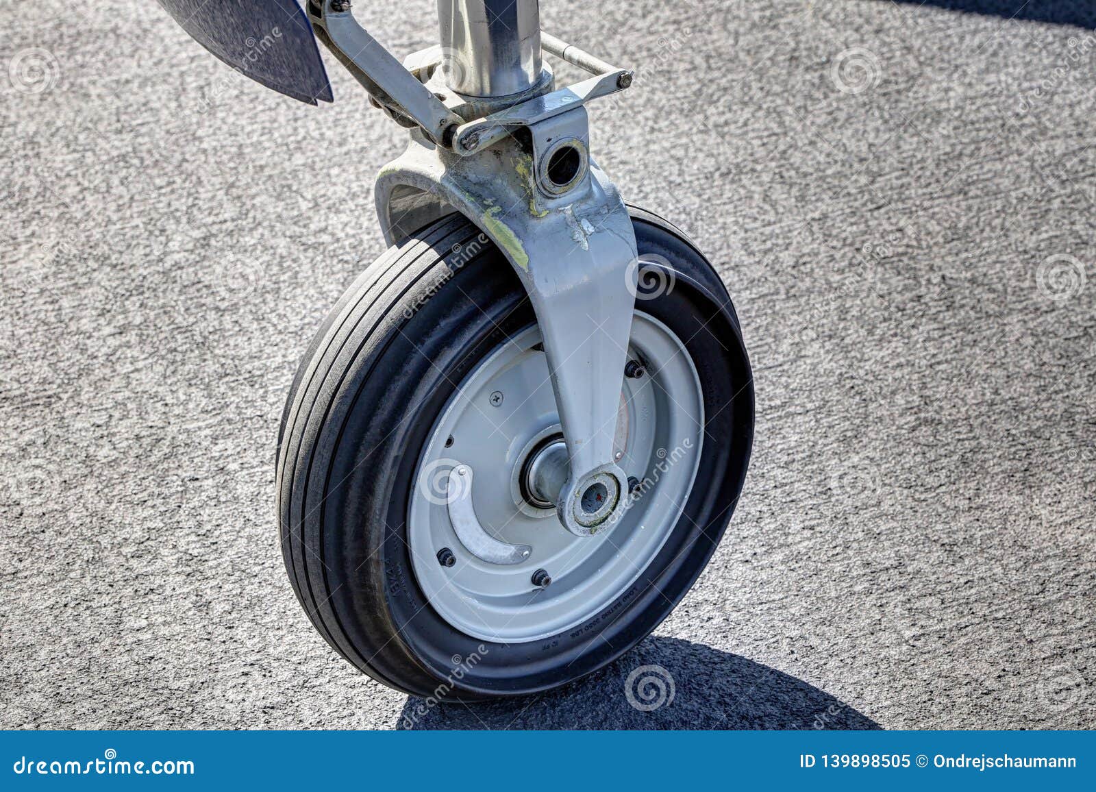 Small Jet Airplane Front Wheel on the Stand Stock Image - Image of ...