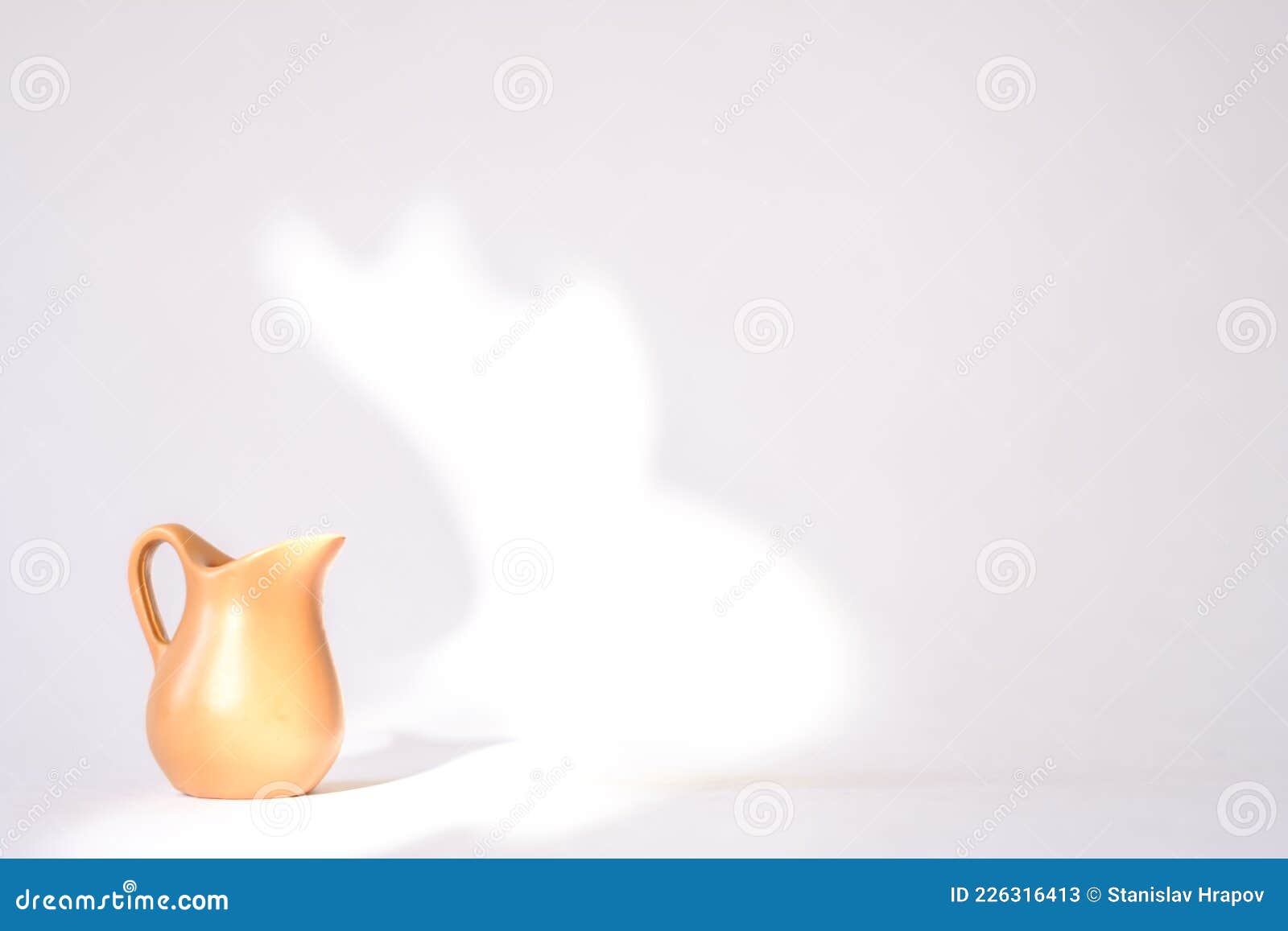 Small Jug on a White Background, Illuminated by the Sun Stock Image ...