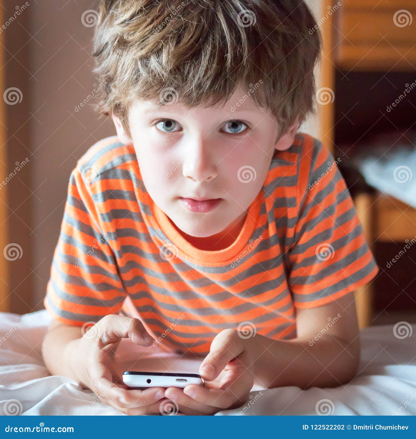 Small Kid Playing on a Smartphone Stock Photo - Image of childhood ...