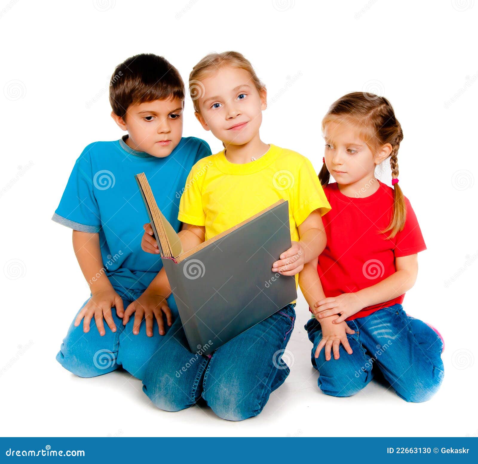 Small kids with a book stock photo. Image of family, people - 22663130
