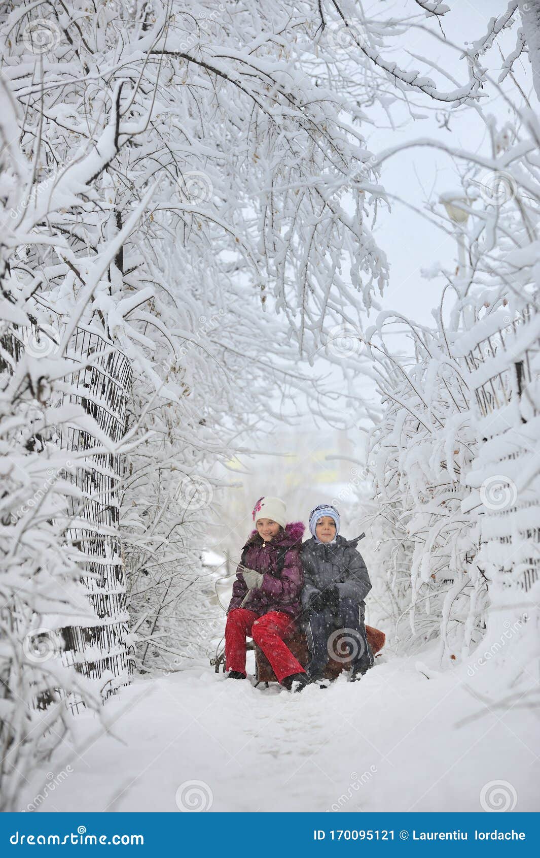 Kids Sliding in Winter Time Stock Image - Image of snow, recreation ...