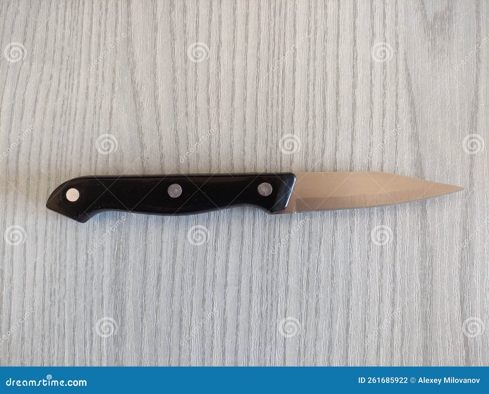 Small Kitchen Knife on a Table Stock Photo - Image of closeup, table ...