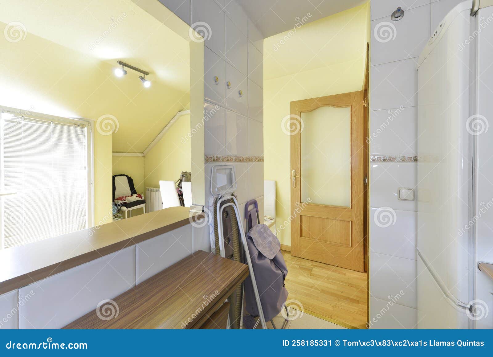 Small Kitchen with Serving Hatch and Living Room with Sloping Ceilings ...