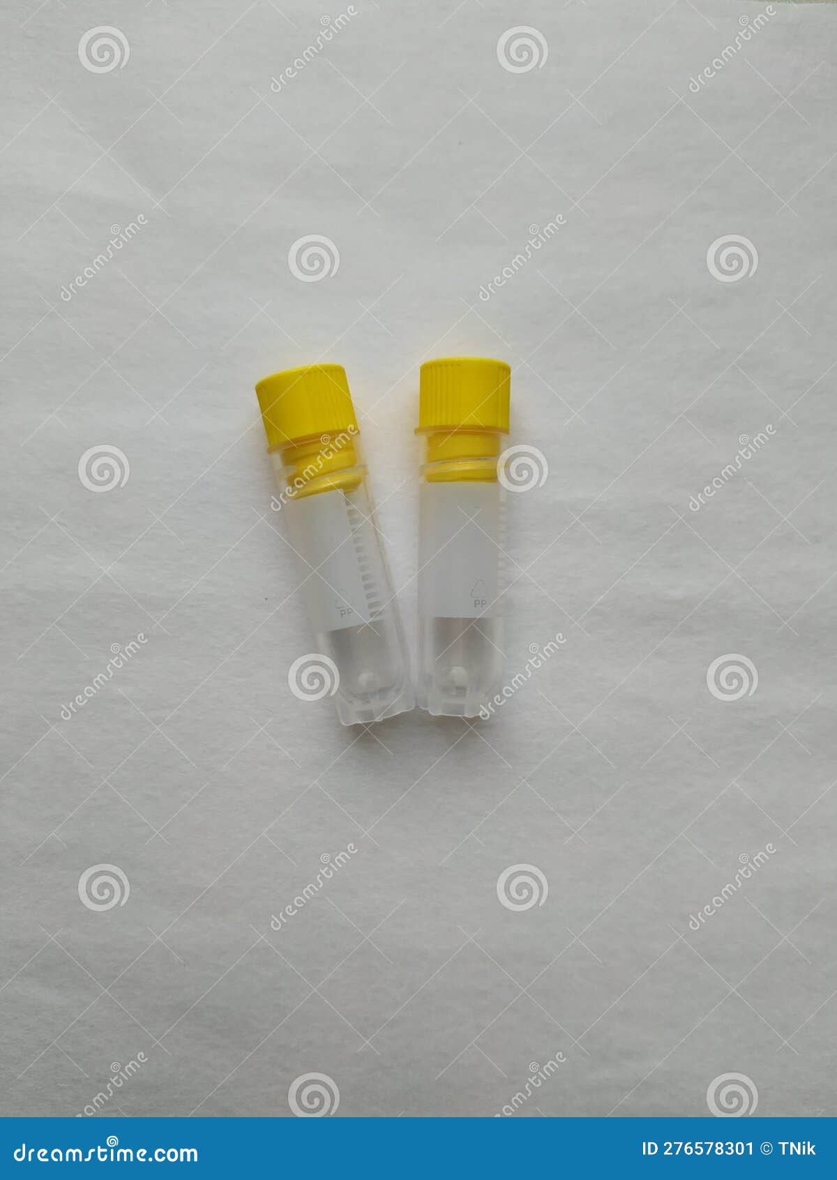 Small Laboratory Test Tubes with a Yellow Caps Stock Image - Image of ...