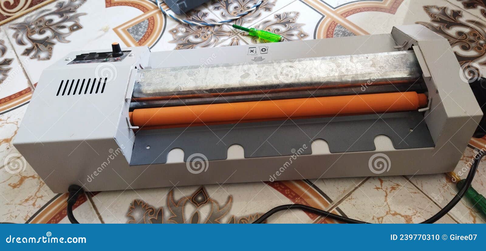 A Small Lamination Machine for Laminate To Paper or Cards Stock Photo ...