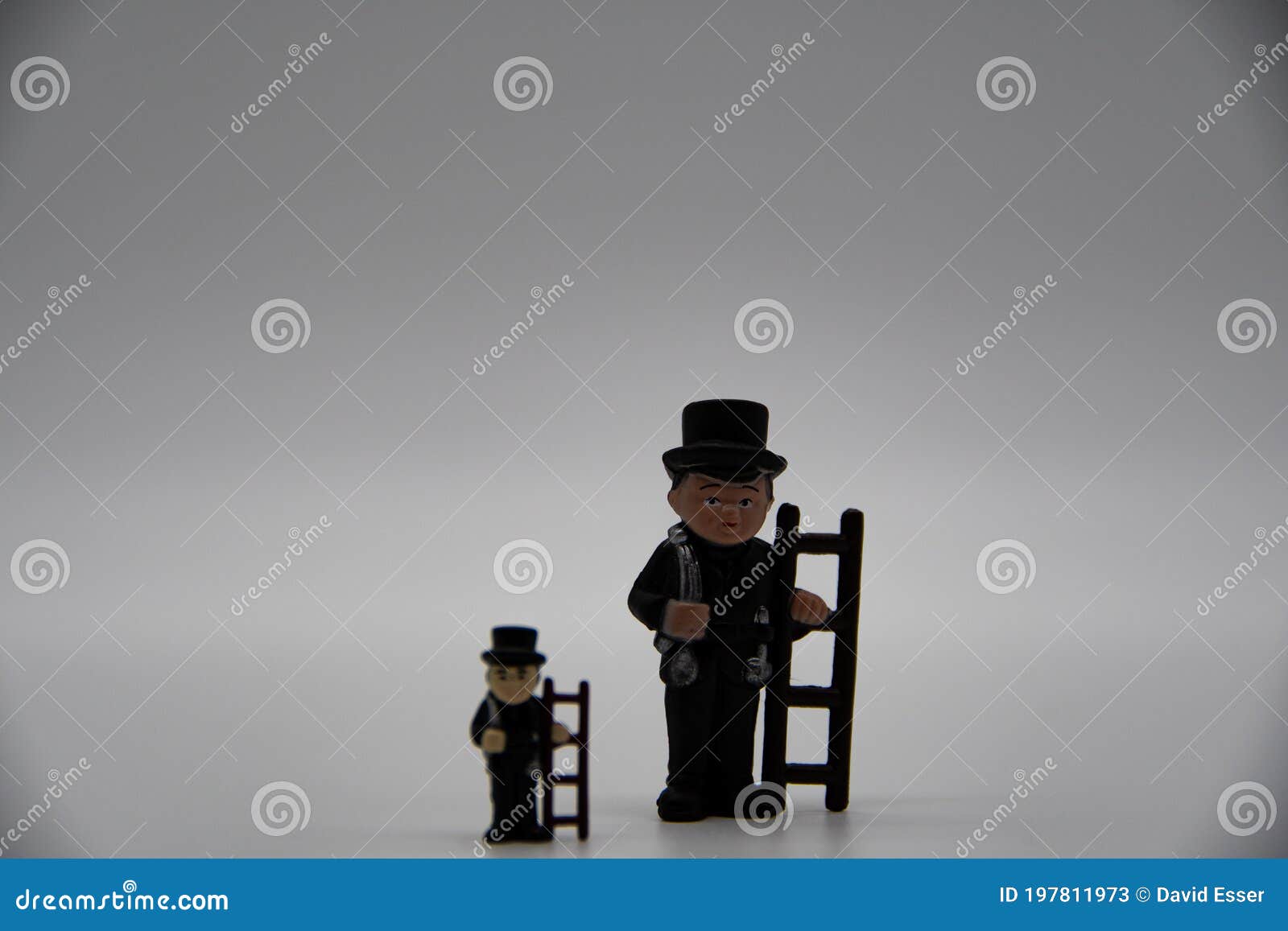 A Small and a Large Chimney Sweep on a Light Background Stock Image ...