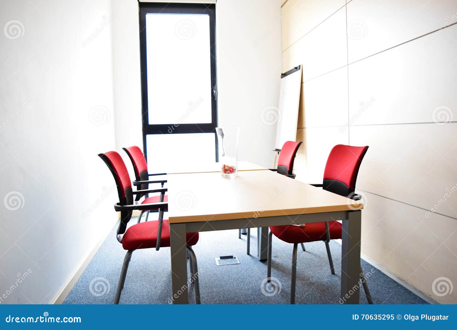 Small Light Empty Office Room with Table and Red Chairs Stock Image ...