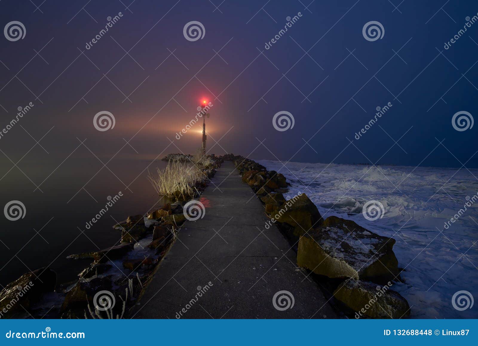 Small Lighthouse in the Lake at Night Stock Photo - Image of evening ...