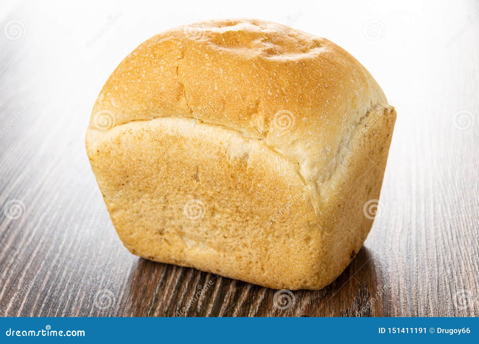 Small Loaf of Bread on Wooden Table Stock Image - Image of close, loaf ...