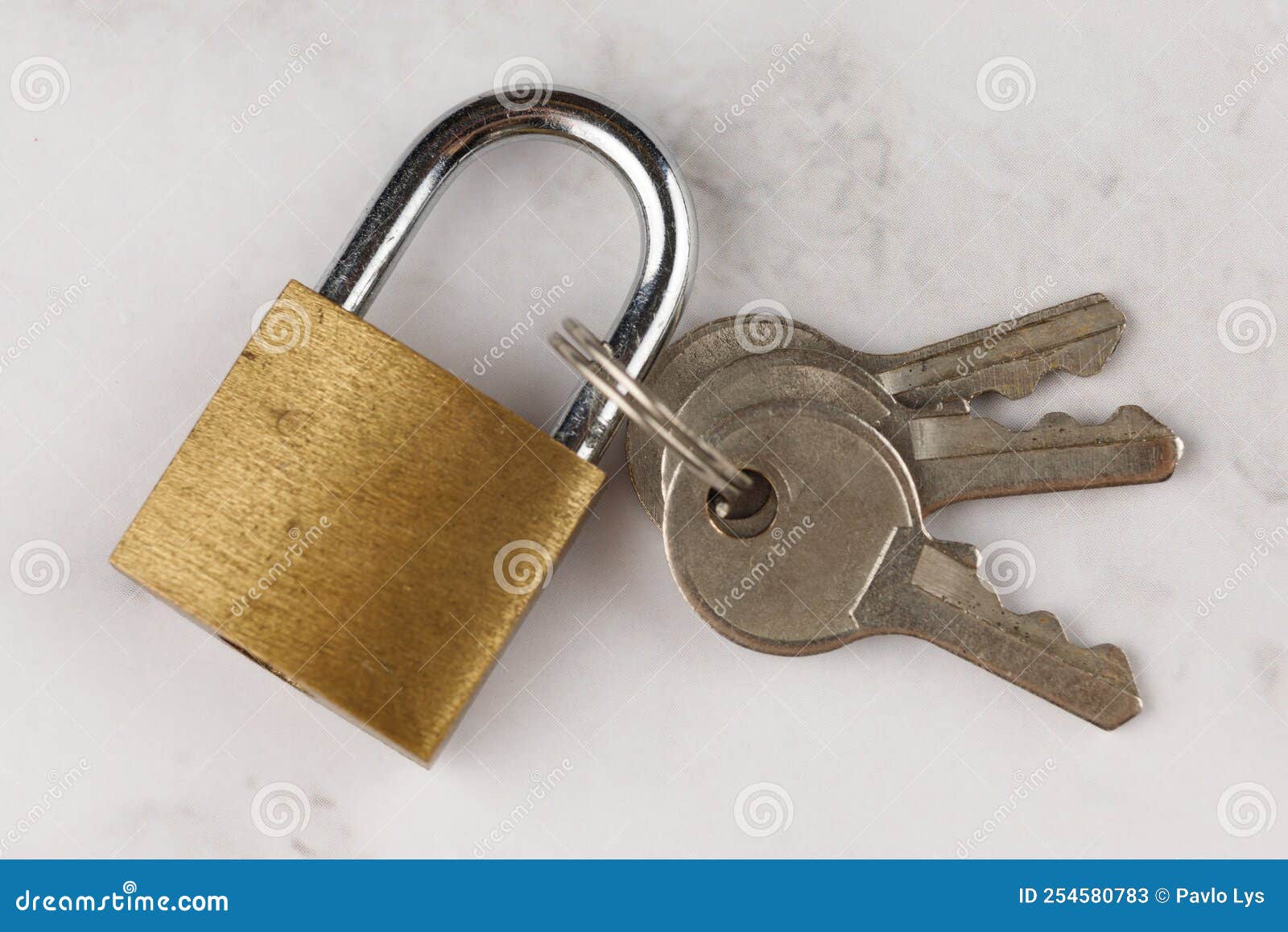Small Lock with Keys. Locked Golden Padlock on the White Background ...