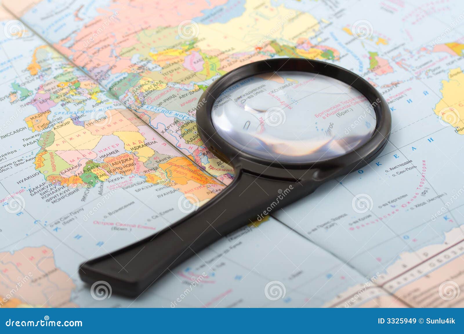 Small magnifier on the map stock image. Image of background - 3325949