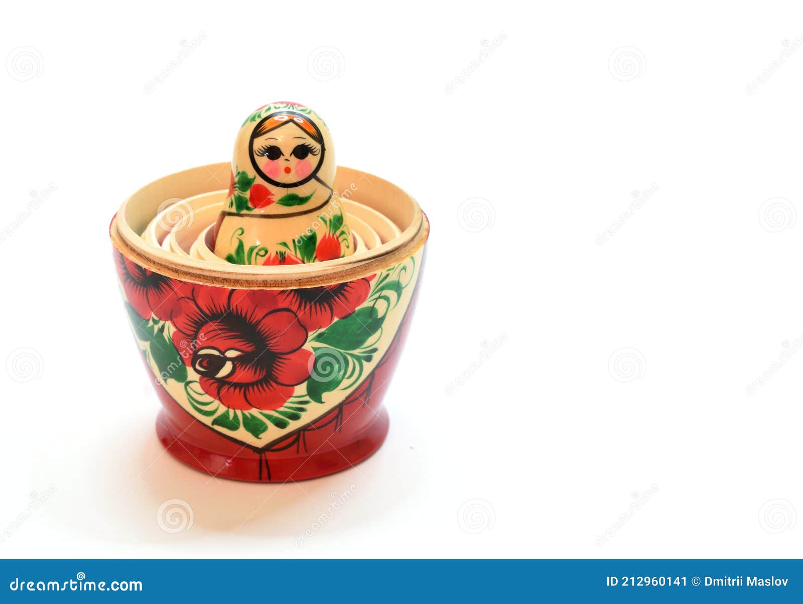 Small Matryoshka Head Sticking Out of the Assembled Bottom of the Set ...