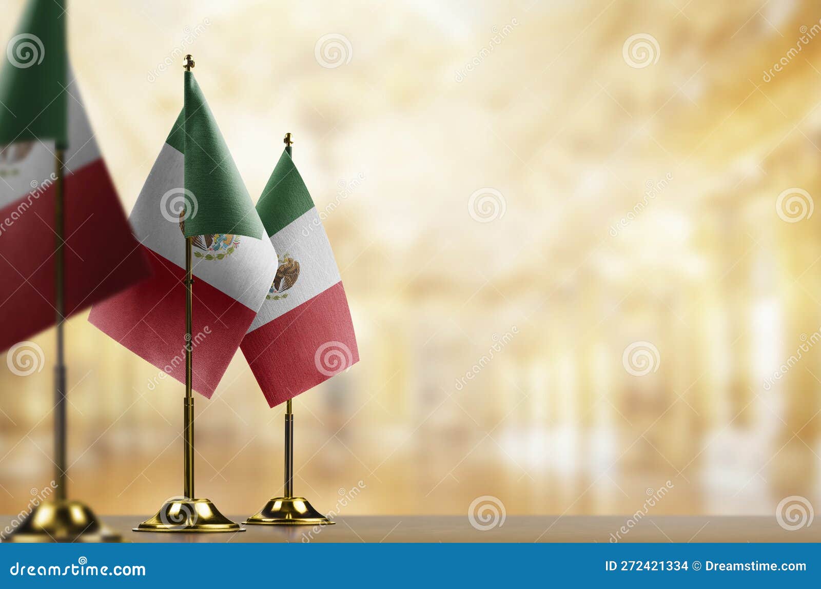 A Small Mexico Flag on an Abstract Blurry Background Stock Photo ...