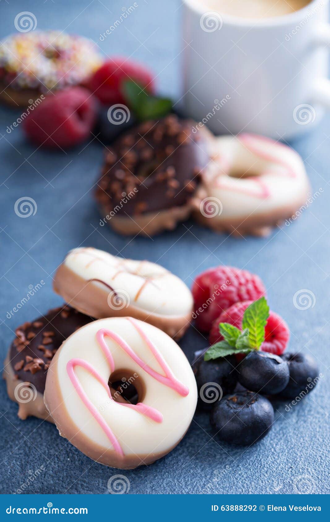 Small Mini Donuts with Fresh Berries Stock Photo - Image of food ...