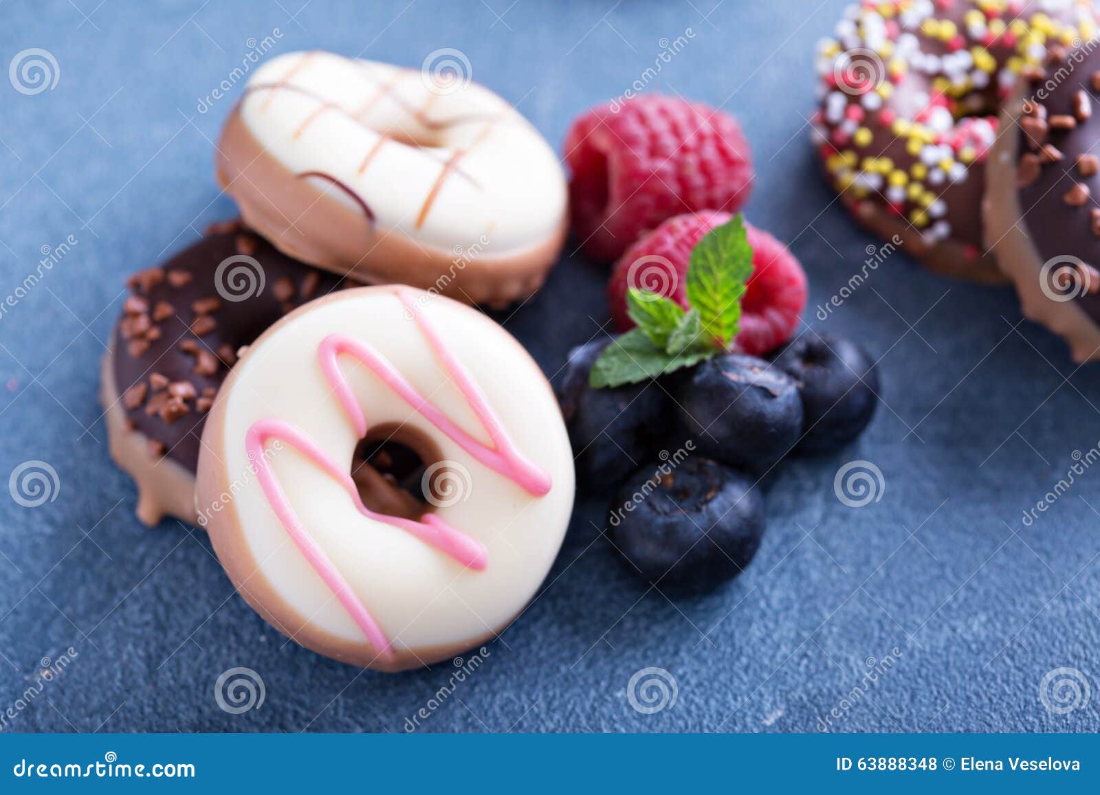 Small Mini Donuts with Fresh Berries Stock Photo - Image of fried ...